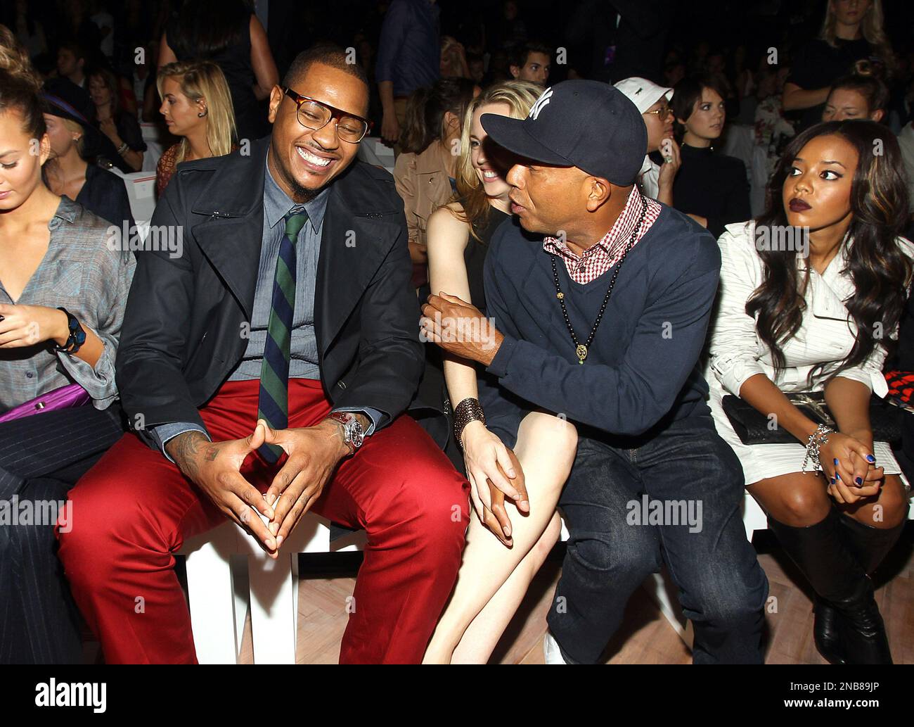 NBA player Carmelo Anthony,left, mogul Russell Simmons and Angel ...