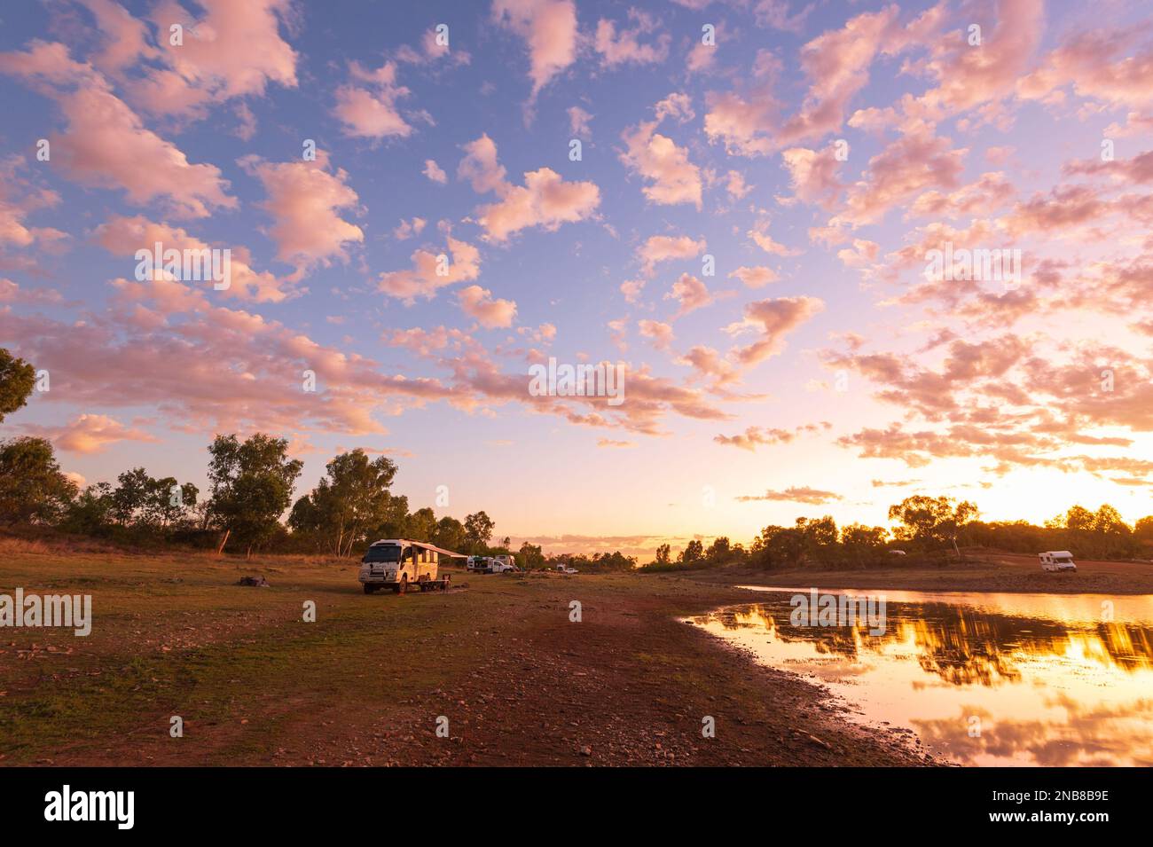 Motorhome camping by the side of a lake at sunset, Corella Dam ...
