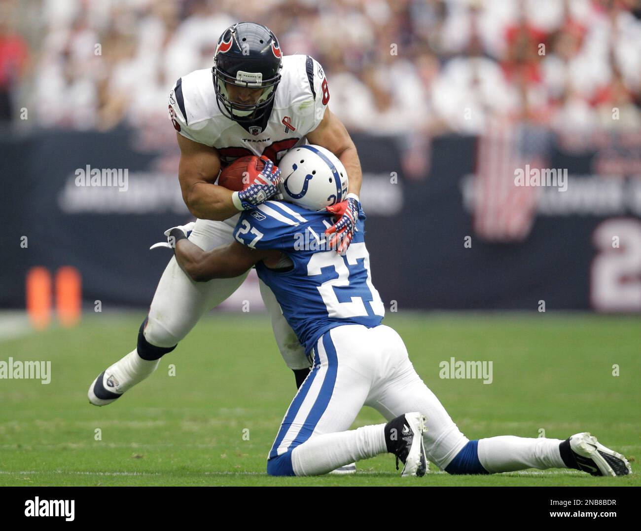 Houston Texans' James Casey (86) is hit by Indianapolis Colts' Jacob ...