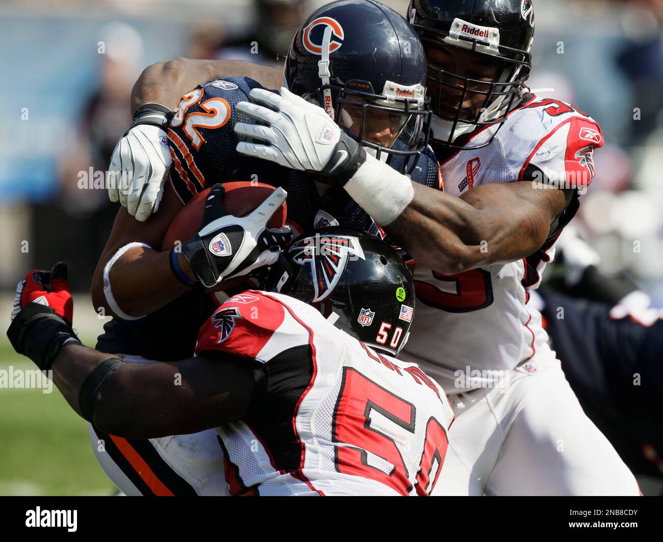 Chicago Bears running back Kahlil Bell (32) is tackled by Atlanta ...