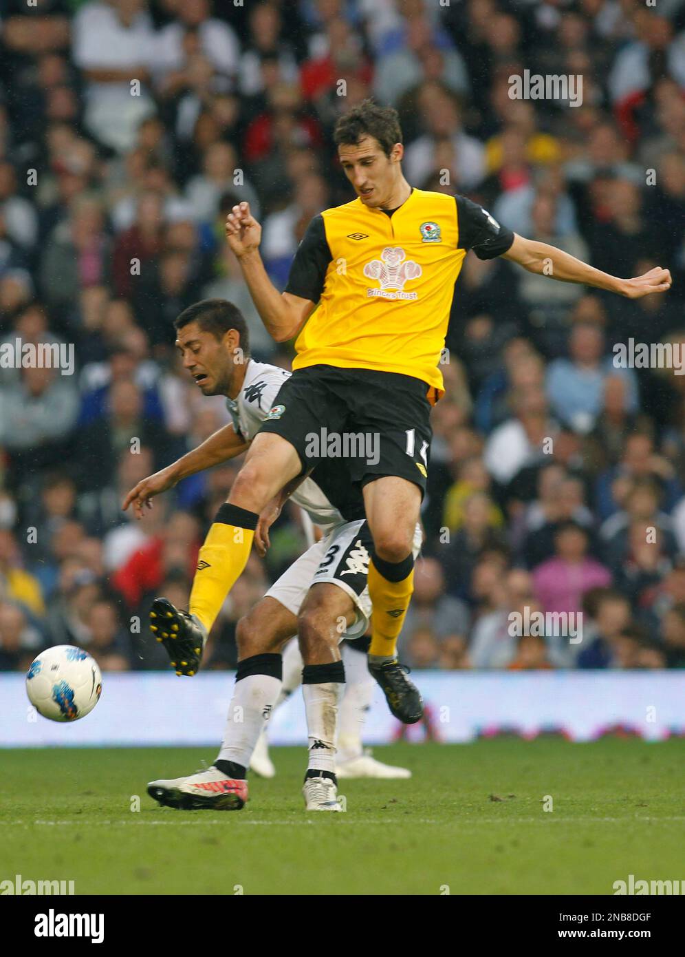 Fulham's Clint Dempsey, left, competes with Blackburn Rovers' Radosav ...