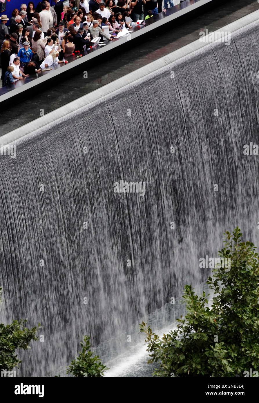Family members visit a September 11 Memorial waterfall during the ...