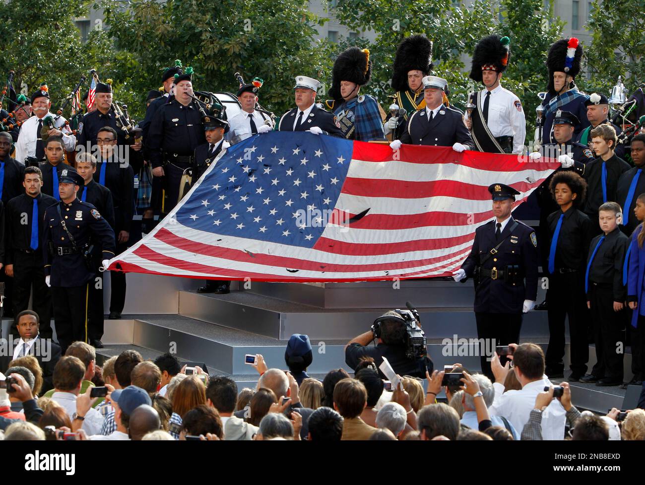 The World Trade Center Flag is presented as friends and relatives of ...