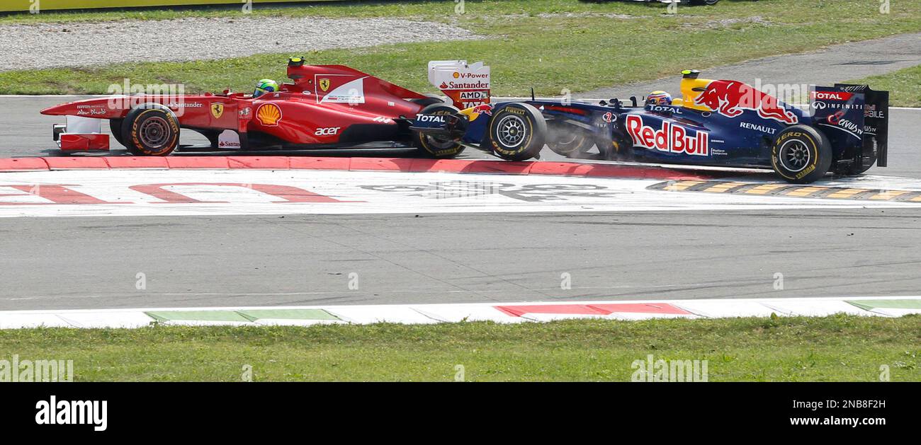 Red Bull driver Mark Webber of Australia, right, crashes with Ferrari ...