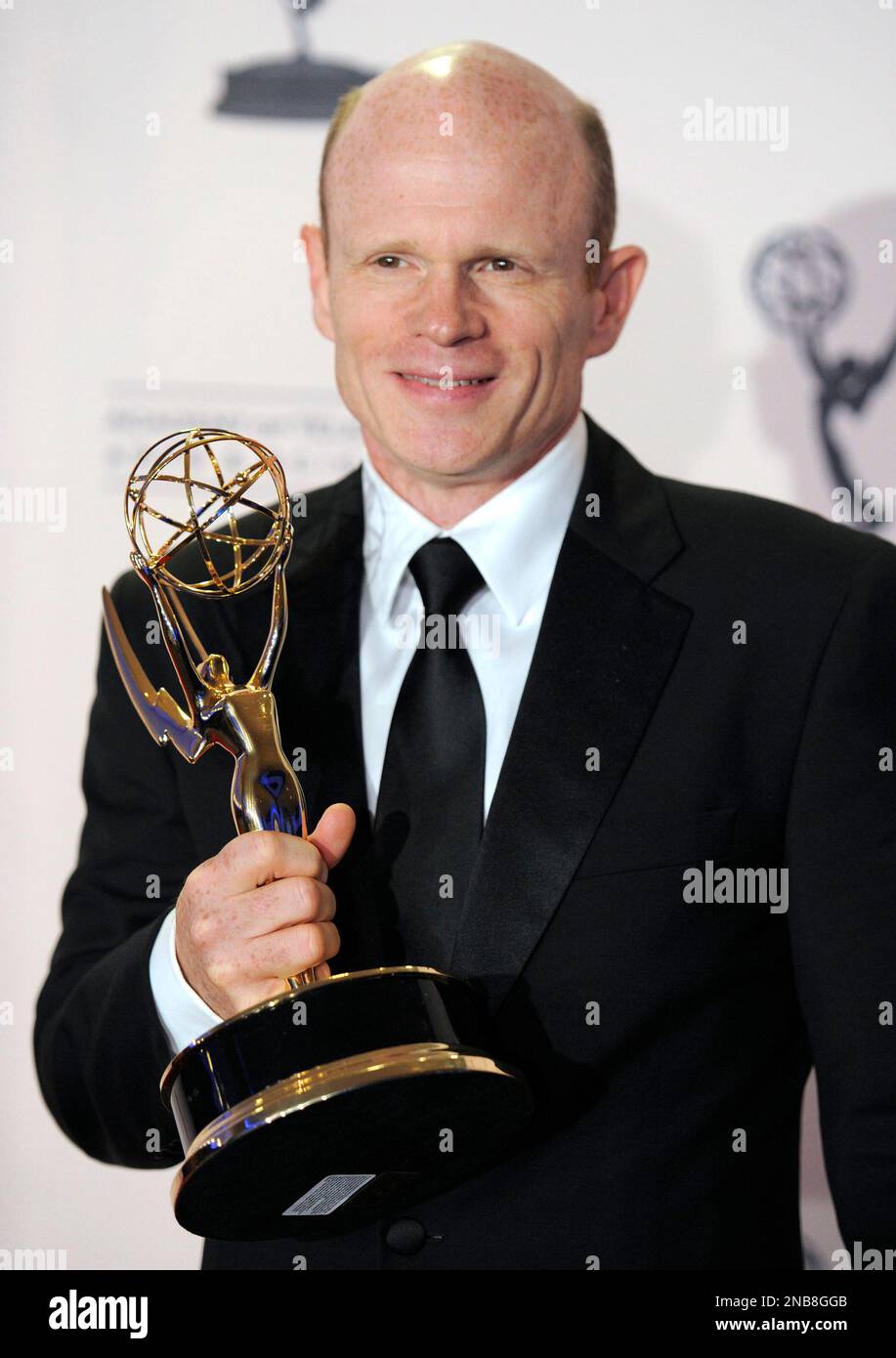 Paul McCrane pose backstage with his award for outstanding guest actor ...