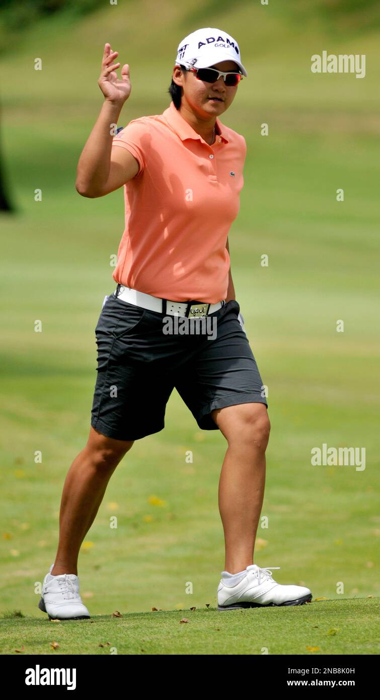 Taiwan's Yani Tseng reacts to the crowd after making a shot on the ...