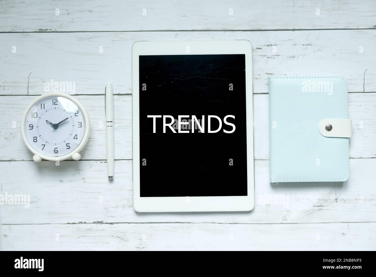 New trends technology business concept. Top view of clock,pen,notebook ...