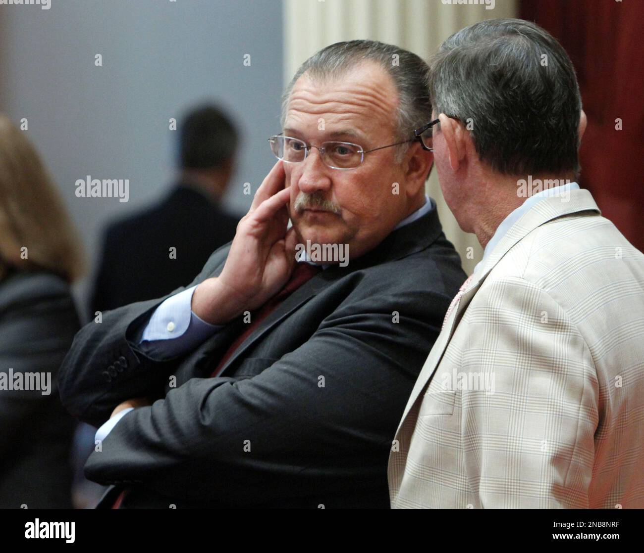 Senate Minority Leader Bob Dutton, R-Rancho Cucamonga, left, talks with ...
