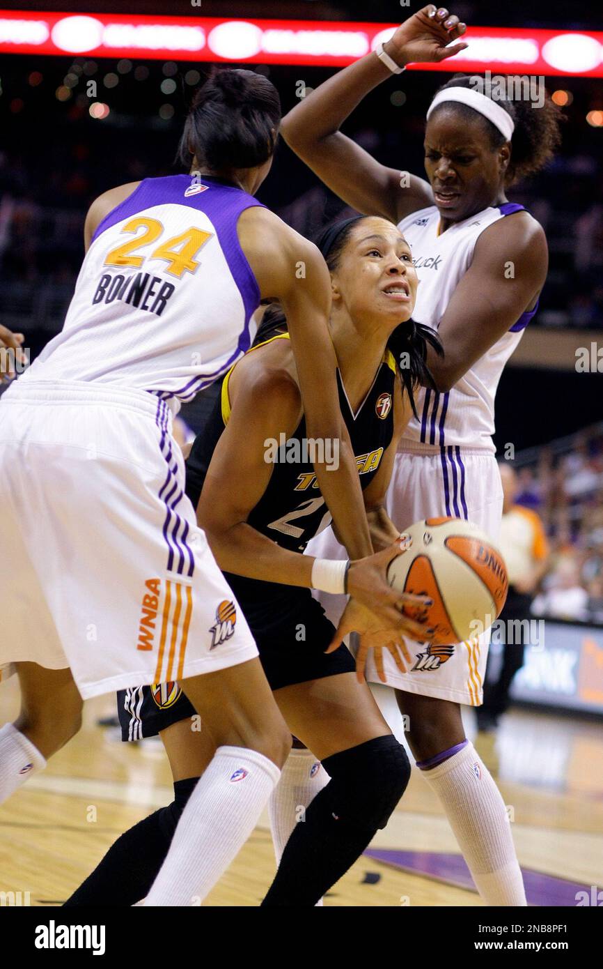 Tulsa Shock's Jennifer Lacy, center, against Phoenix Mercury's DeWanna ...