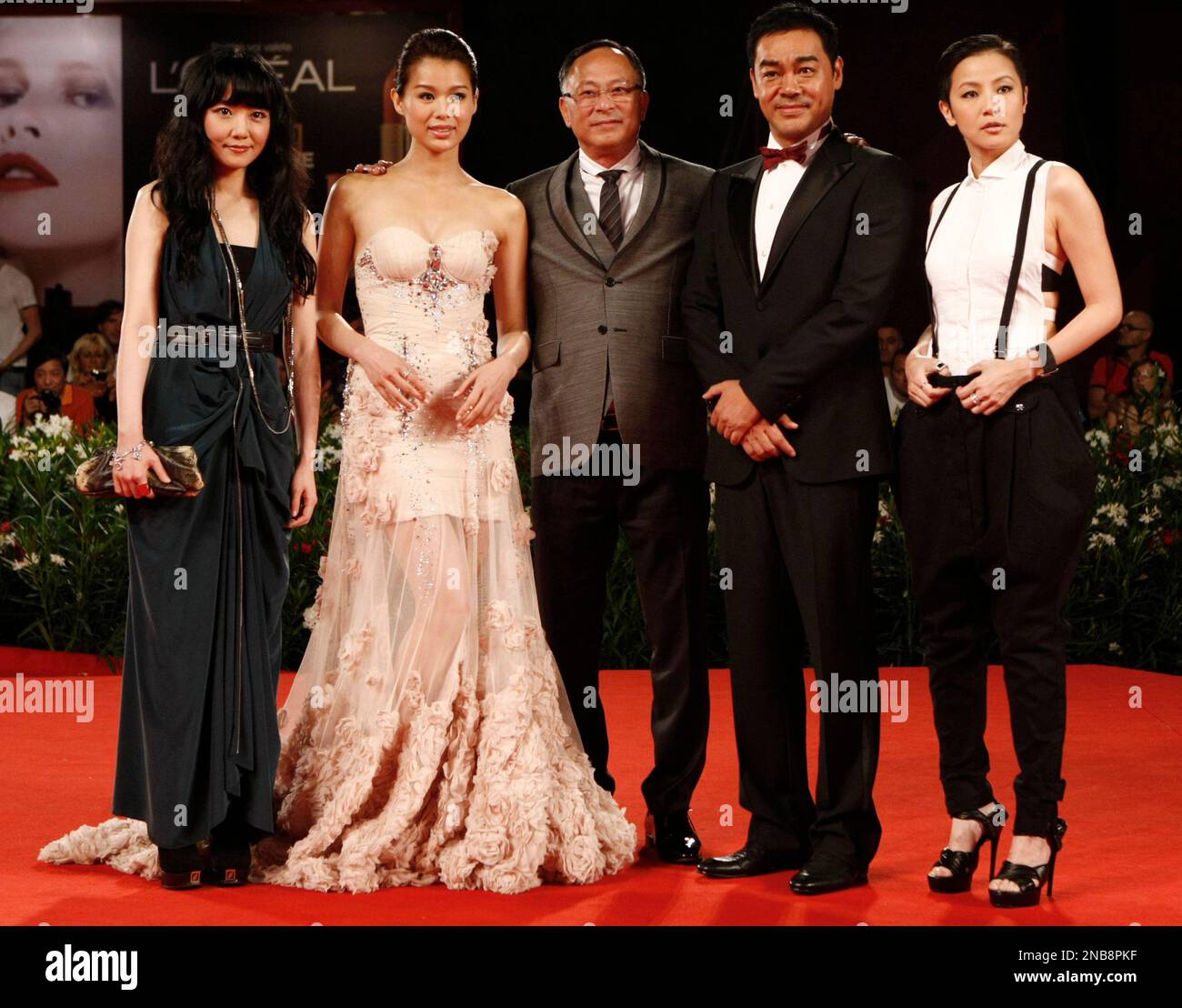From left, Actresses Stephanie Che and Myolie Wu, director Johnnie To ...