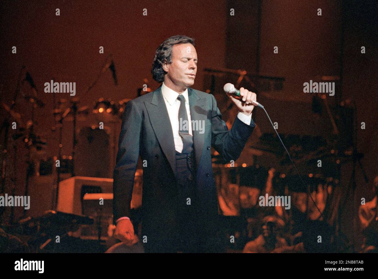 Julio Iglesias sings during his performance on stage at Radio City ...