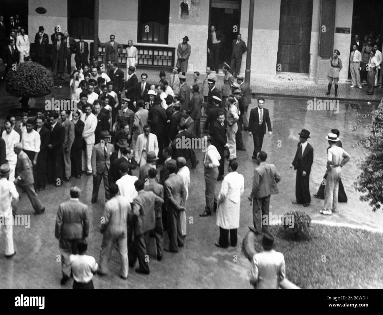 Fascist prisoners lining up in a main corridor of the central police ...