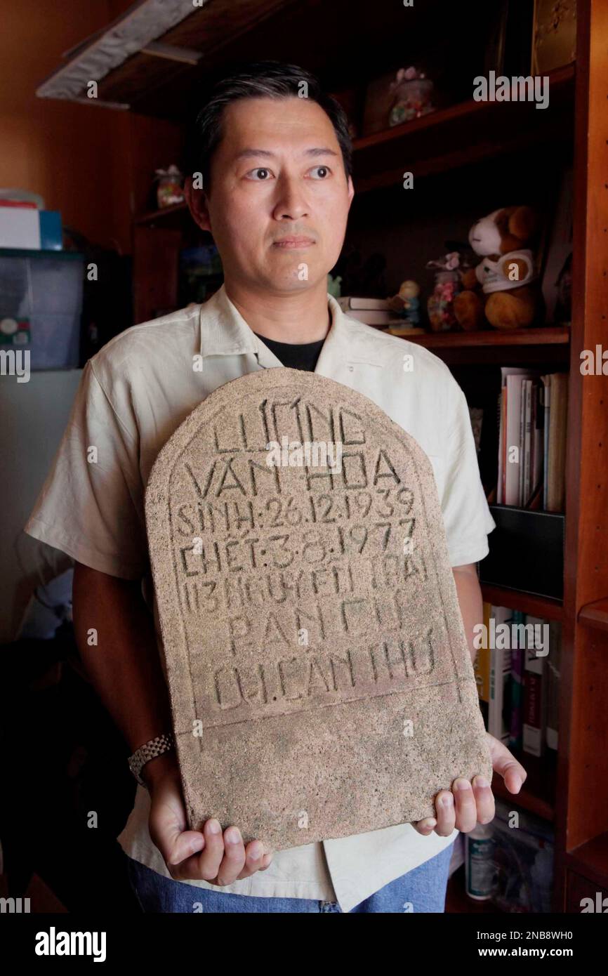 In this photo taken Friday, July 29, 2011, Daniel Luong holds the ...