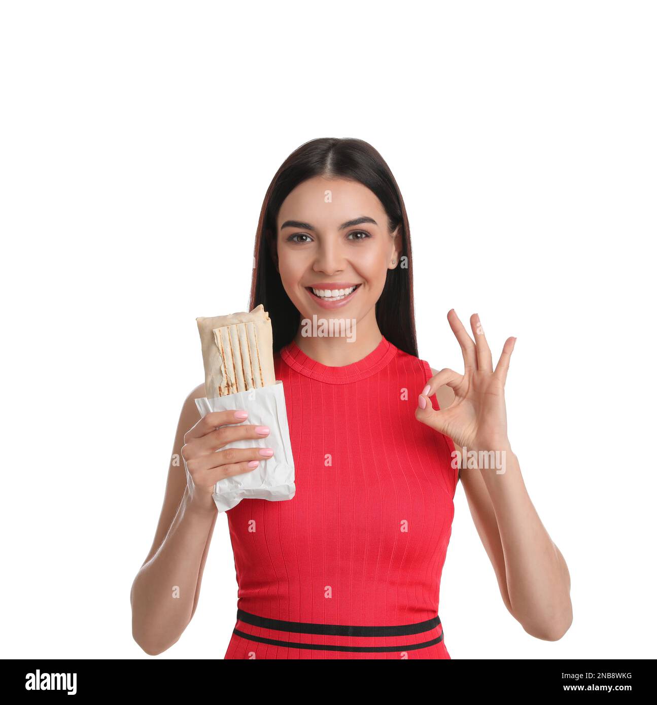 Happy young woman with delicious shawarma on white background Stock ...