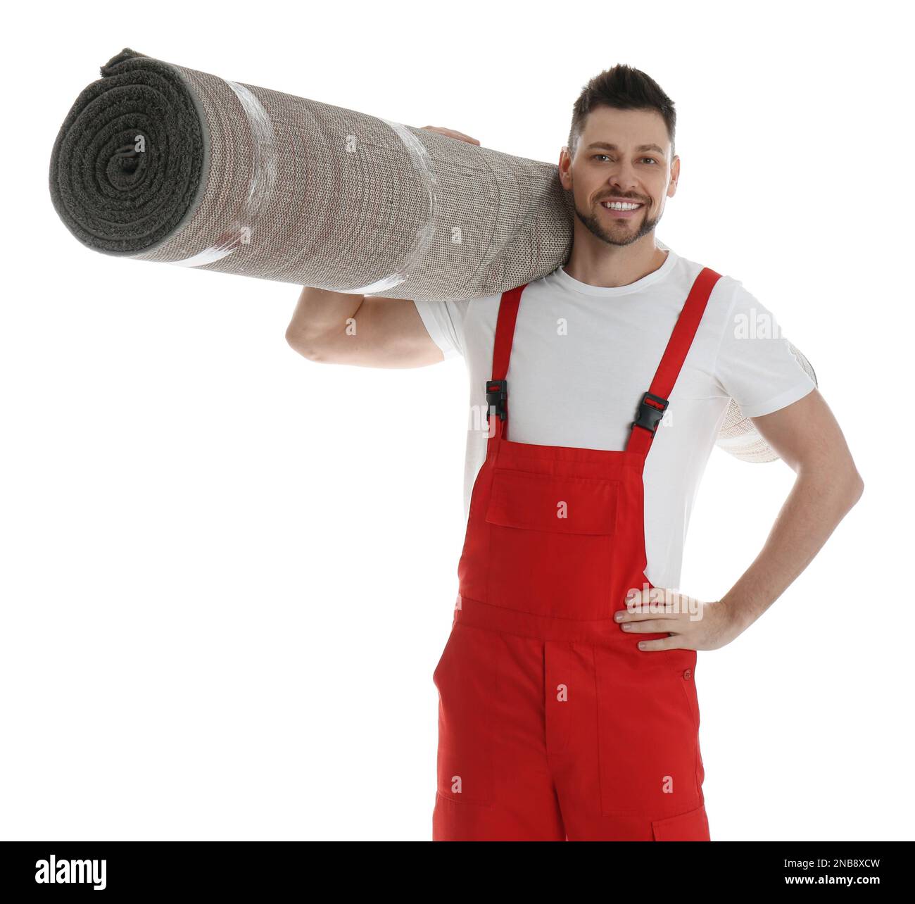 Man carrying rolled carpet hi-res stock photography and images - Alamy