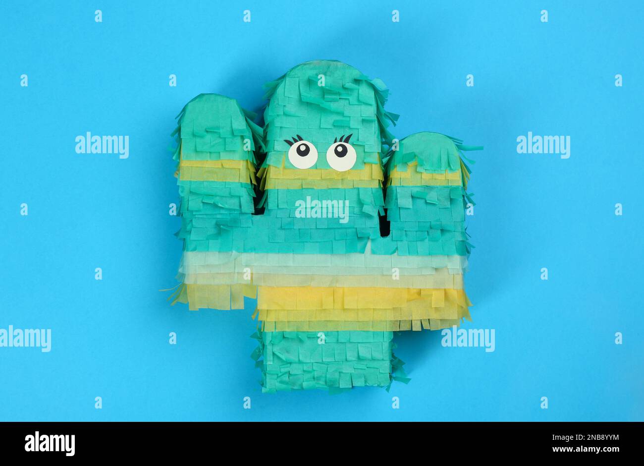 Bright cactus pinata on light blue background, top view Stock Photo - Alamy