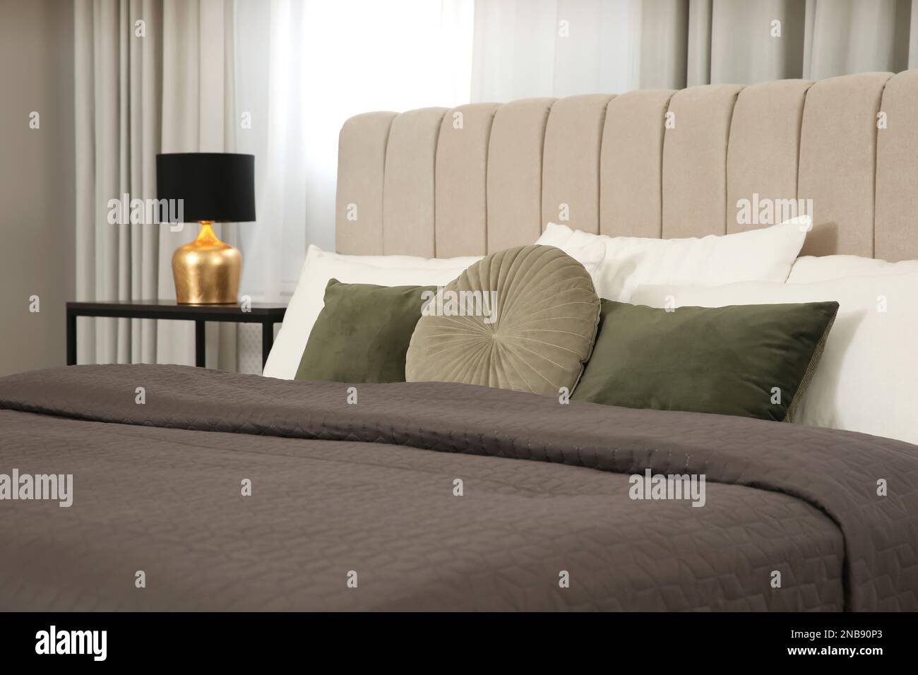 Beautiful hotel room with comfortable double bed Stock Photo - Alamy