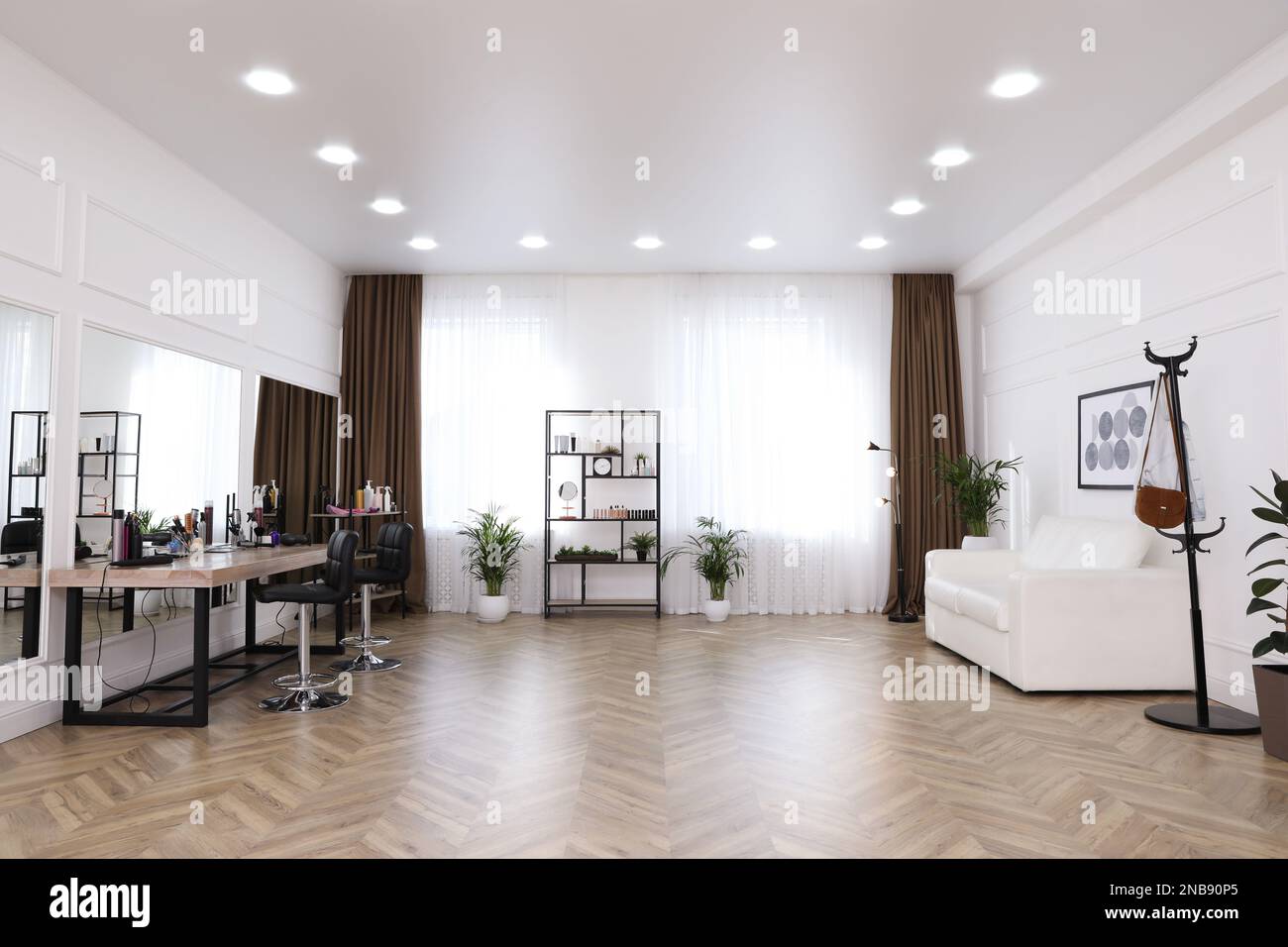 Stylish beauty salon interior with hairdresser's workplace Stock Photo ...