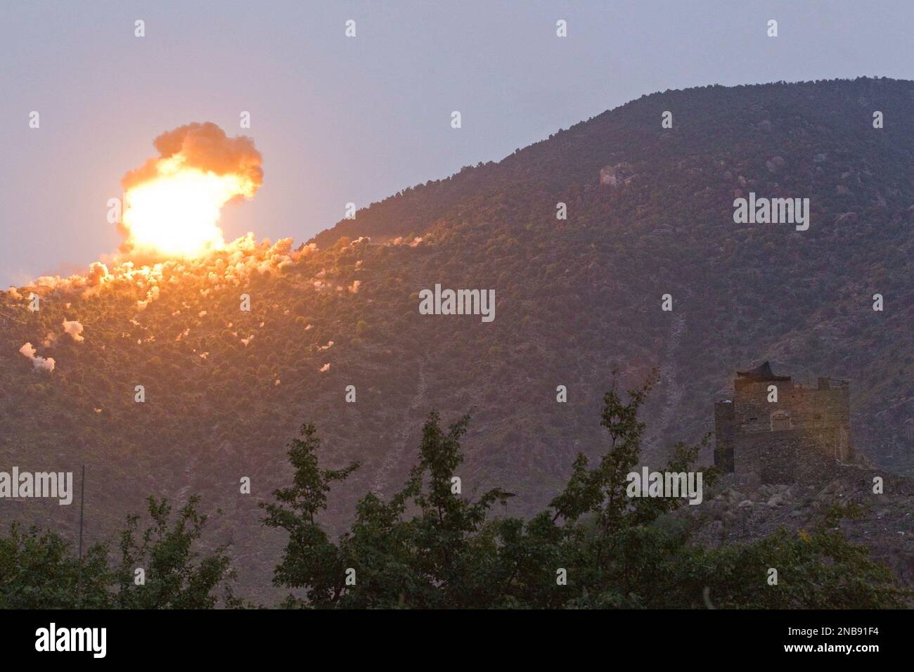 A bomb dropped by a U.S. fighter jet explodes on an insurgent target ...