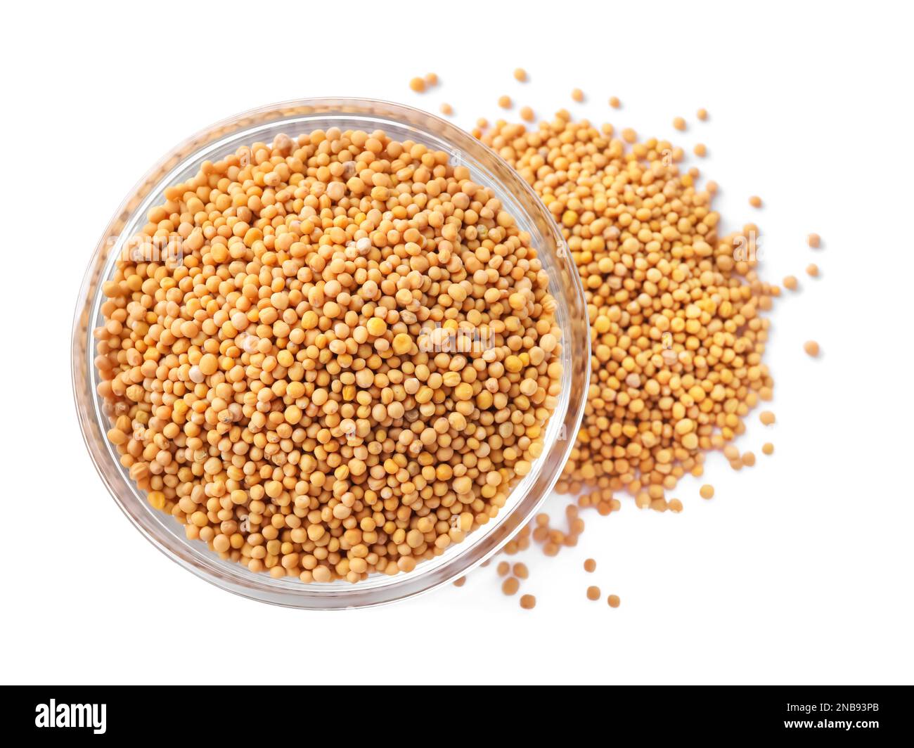 Mustard seeds with bowl isolated on white, top view Stock Photo - Alamy