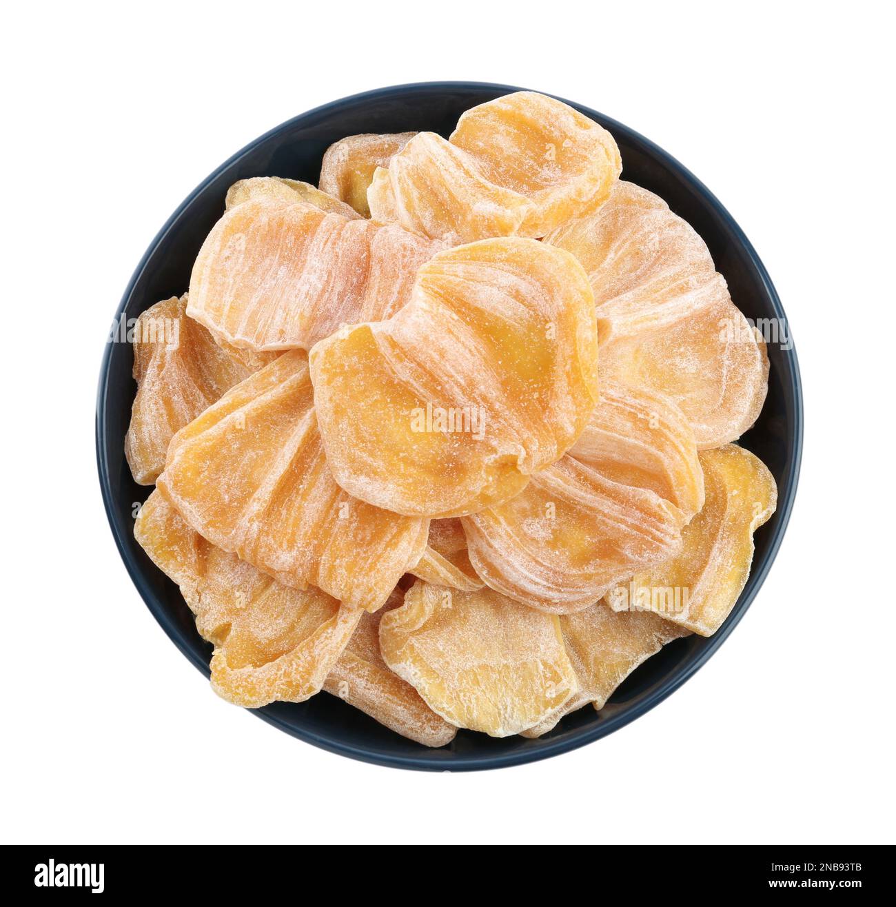Delicious dried jackfruit slices in bowl isolated on white, top view ...