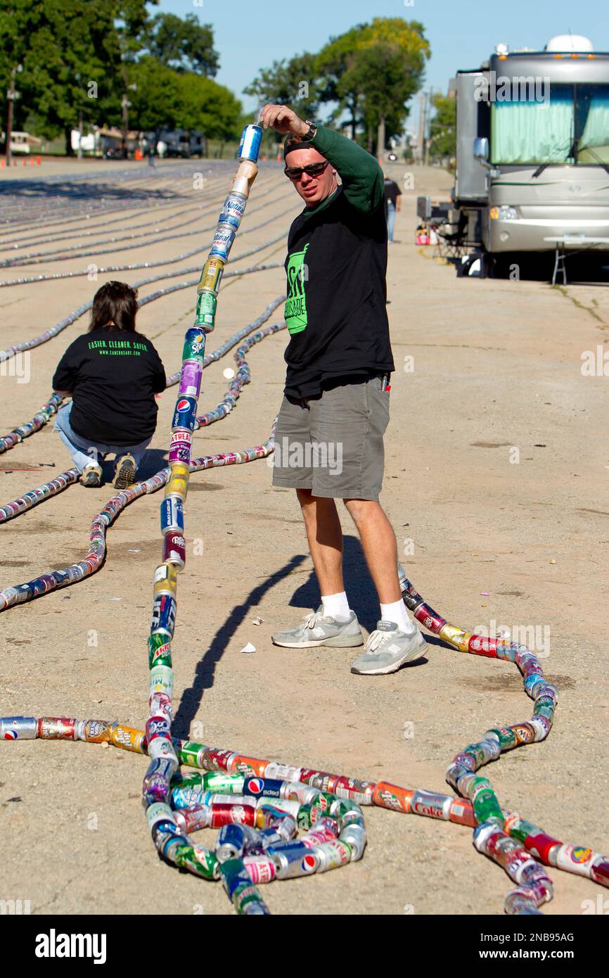 Workers at the Can Crusade to break the world record for the longest ...