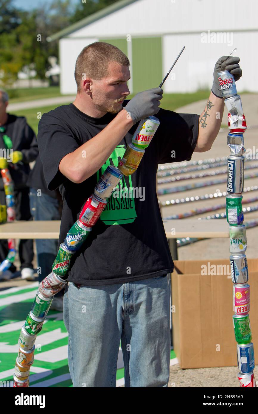 Workers at the Can Crusade to break the world record for the longest ...
