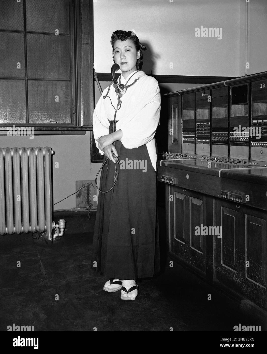 The other end of the telephone system as this operator handles all the ...