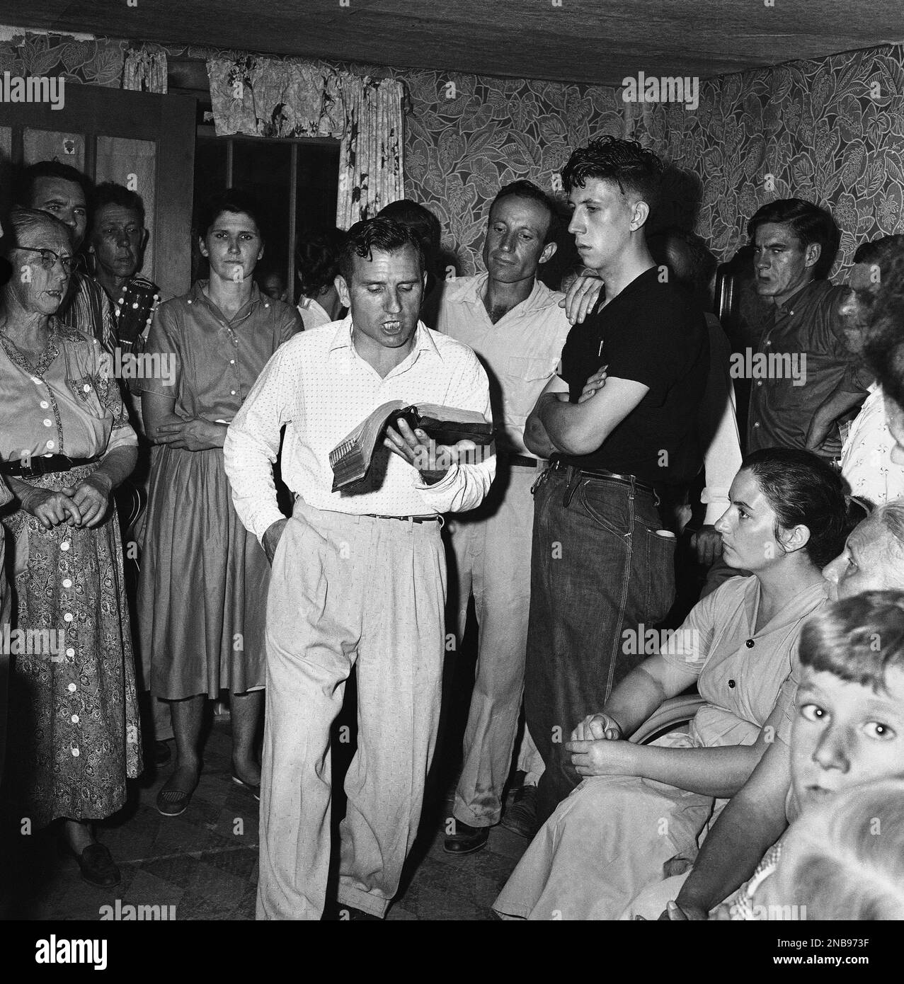 Rev. Shiloh Collins, 39, conducts his Holiness Church meeting in the ...
