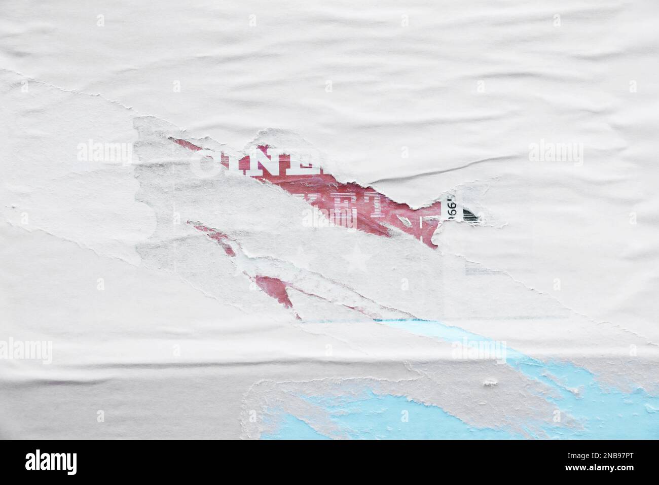 Creased torn poster and color paper as background Stock Photo - Alamy