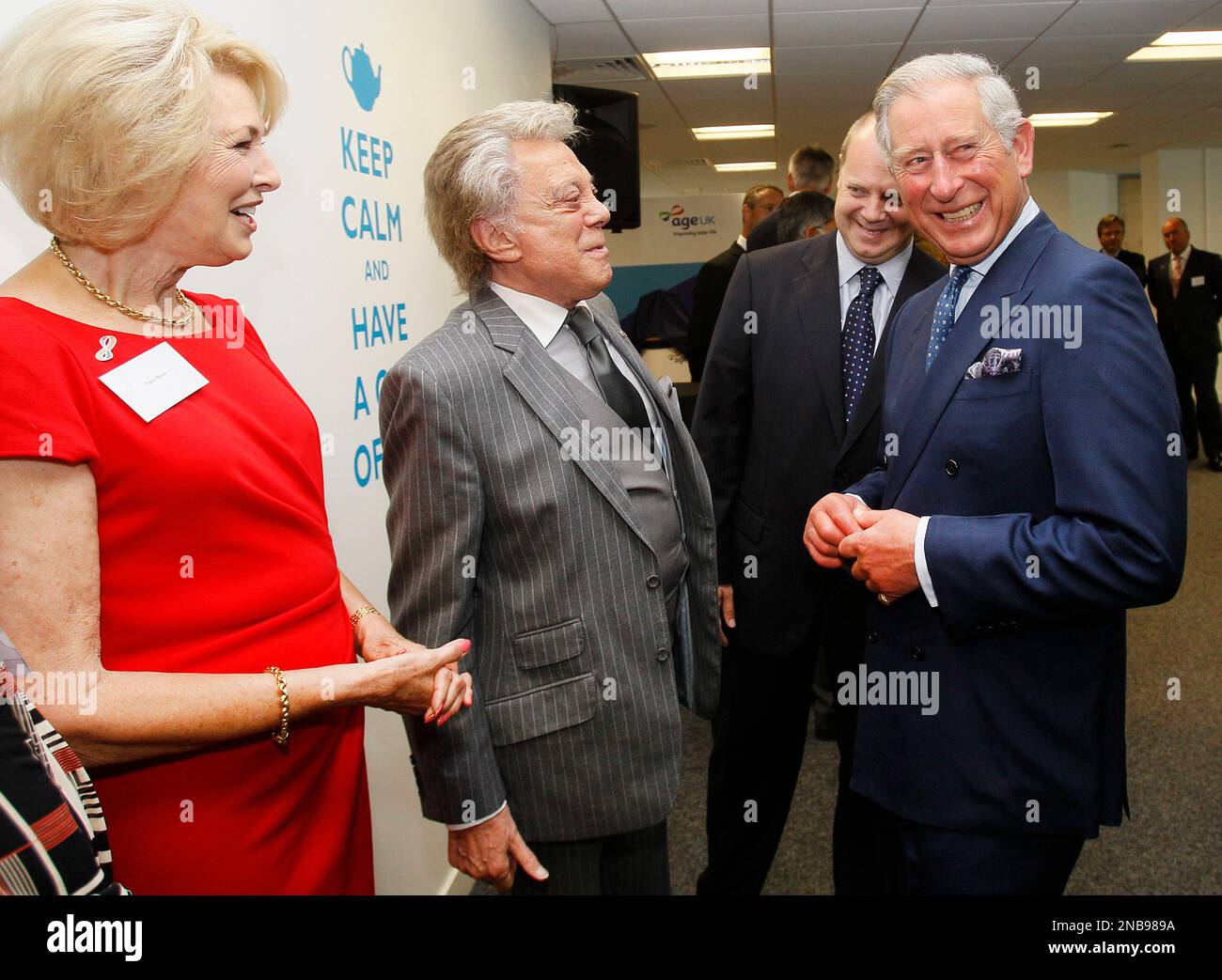 Britain's Prince Charles, right, meets actor and entertainer Lionel ...