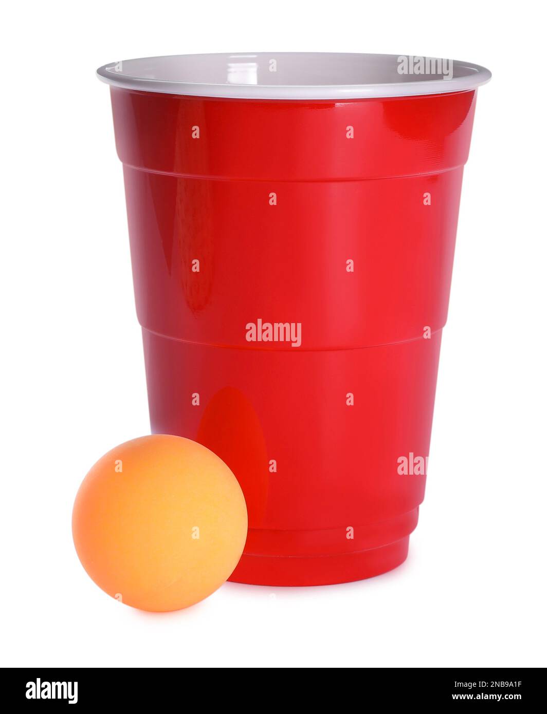 Plastic cup and ball for beer pong on white background Stock Photo - Alamy