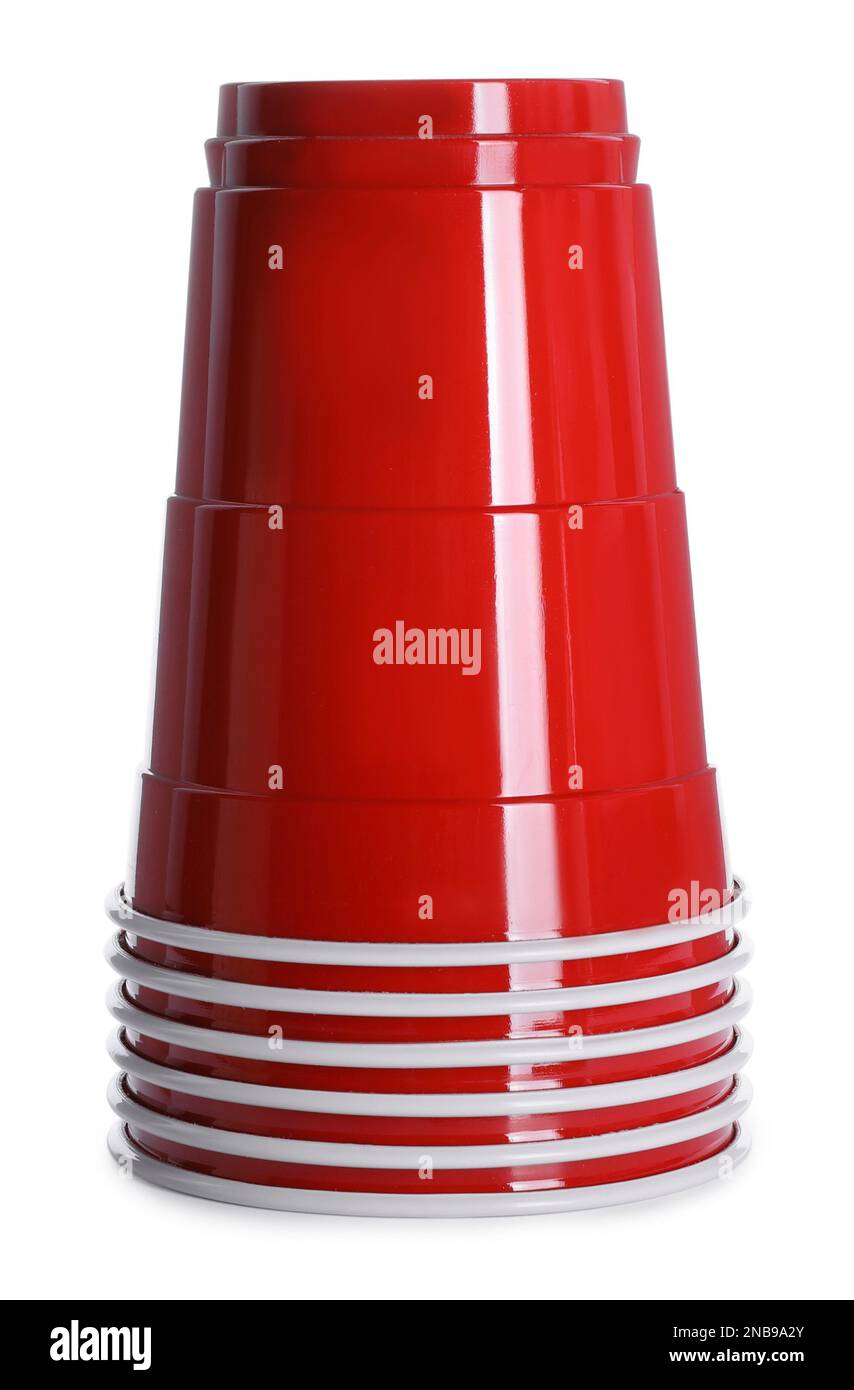 Many red plastic cups on white background Stock Photo - Alamy