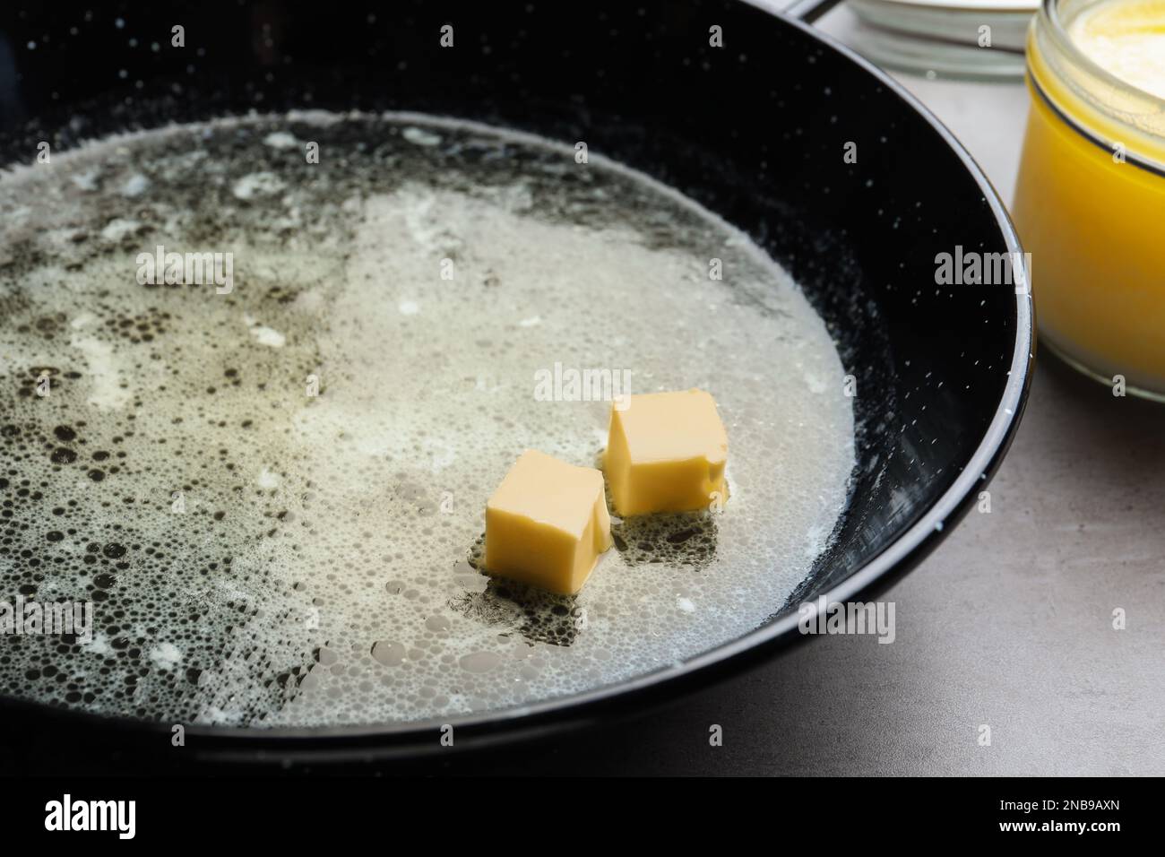 Margarine melting in frying pan hi-res stock photography and images - Alamy