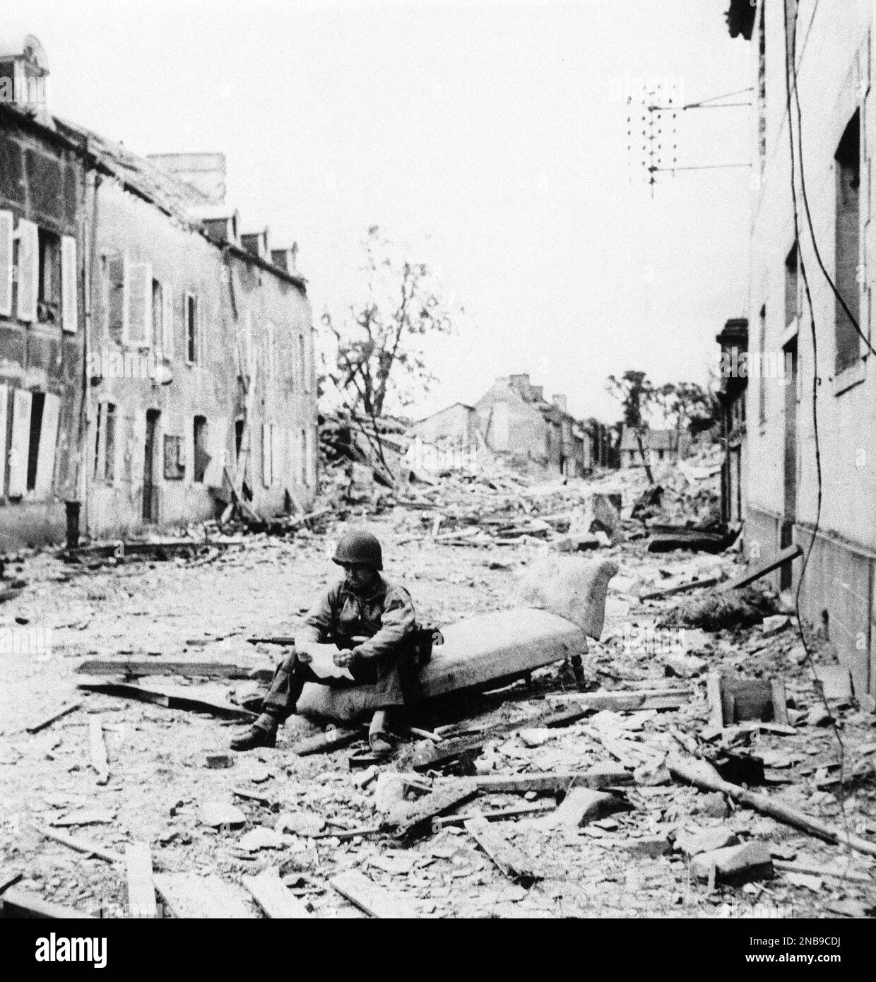 Although surrounded by war-torn buildings and debris littered streets ...