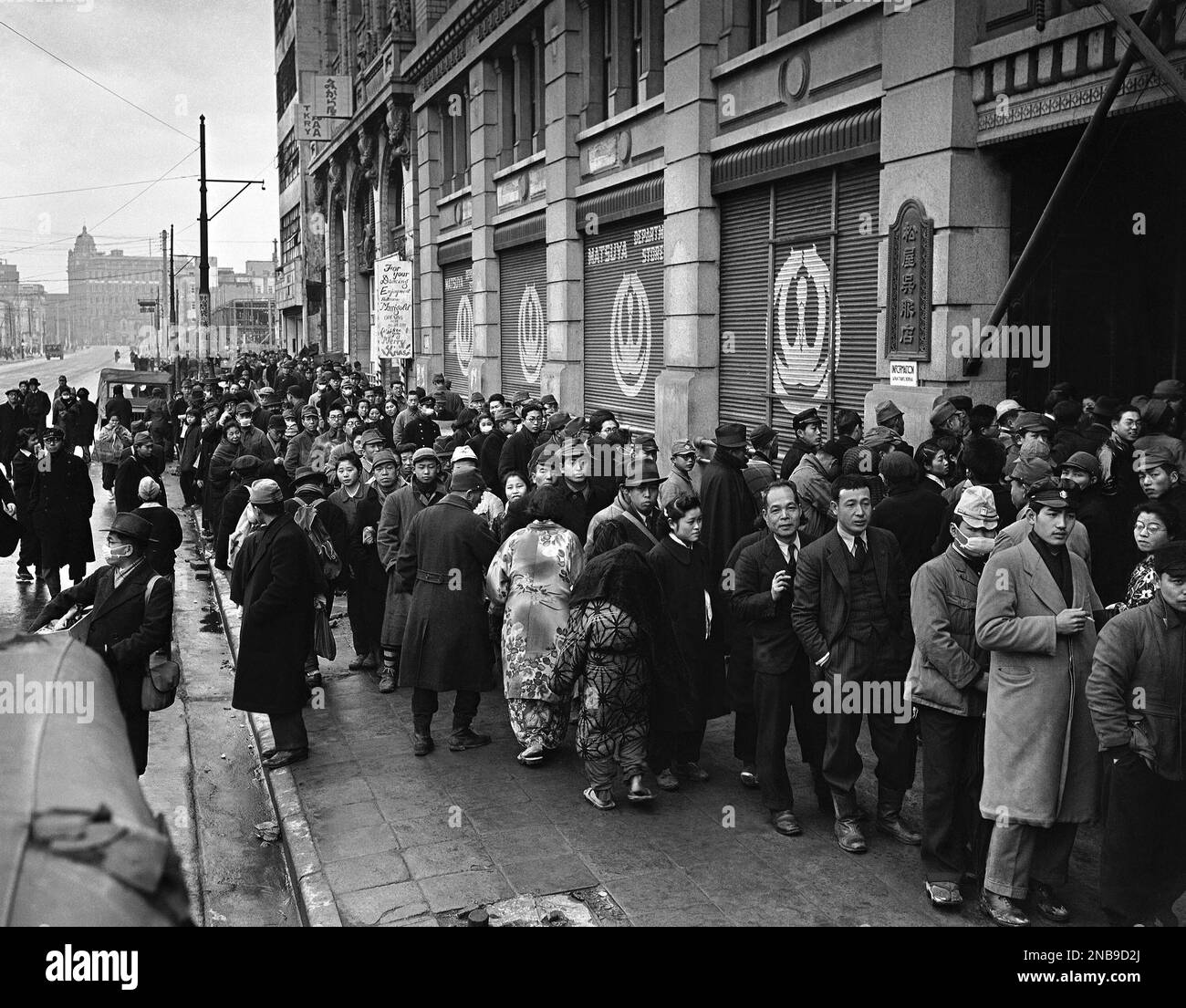 Part of the crowd that waited in line to purchase the new Japanese ...