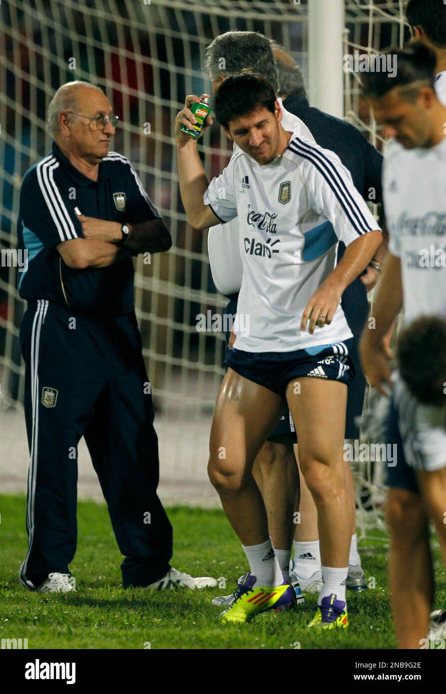 Argentina soccer team captain Lionel Messi uses a spray before a ...