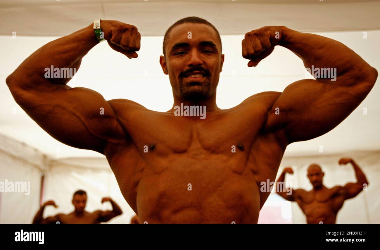 Contestants pose for pictures backstage during the Mr Mexico ...