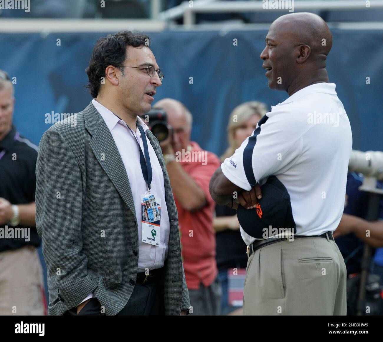 Chicago Bears president and CEO Ted Phillips, left, talks with head ...