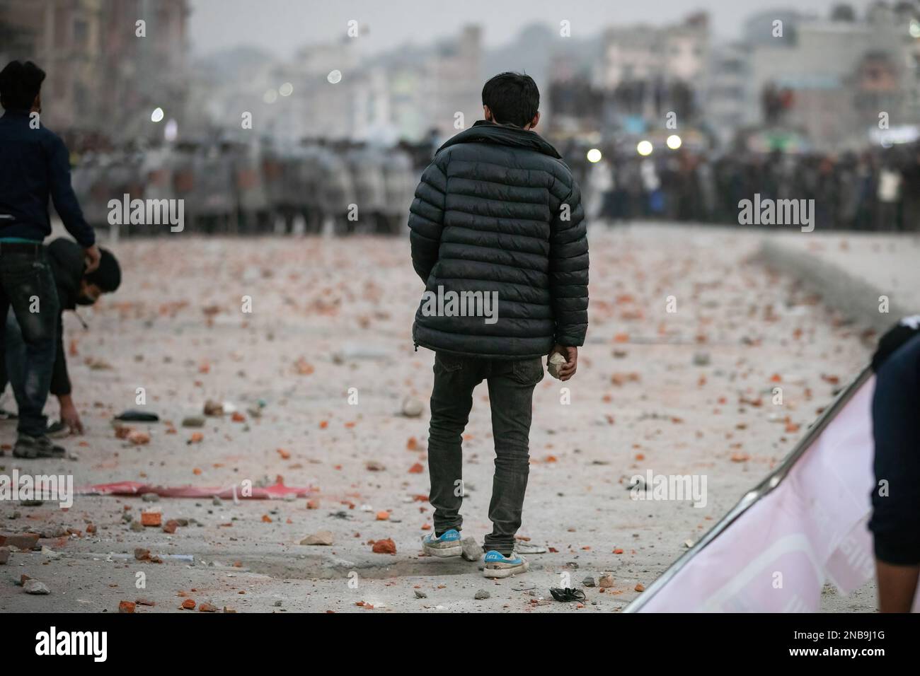 Kathmandu, Nepal. 13th Feb, 2023. Protesters hurl bricks and stones at ...