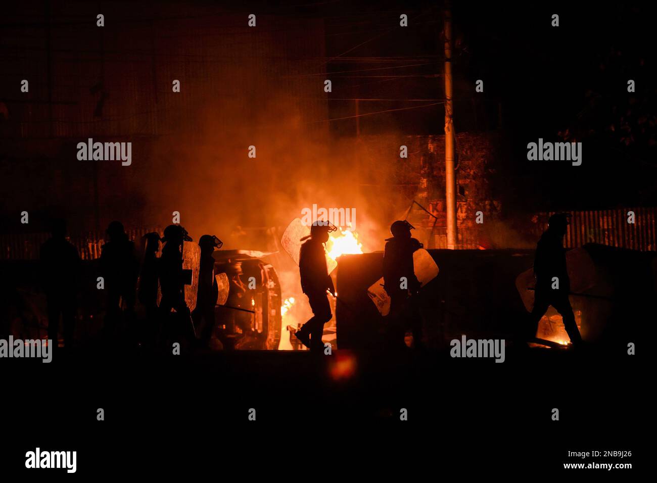 Kathmandu, Nepal. 13th Feb, 2023. Flames of fire are seen from a ...