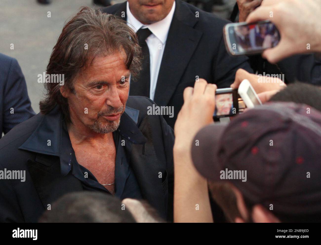 U.S. actor Al Pacino signs autographs for fans as he arrives on the red ...