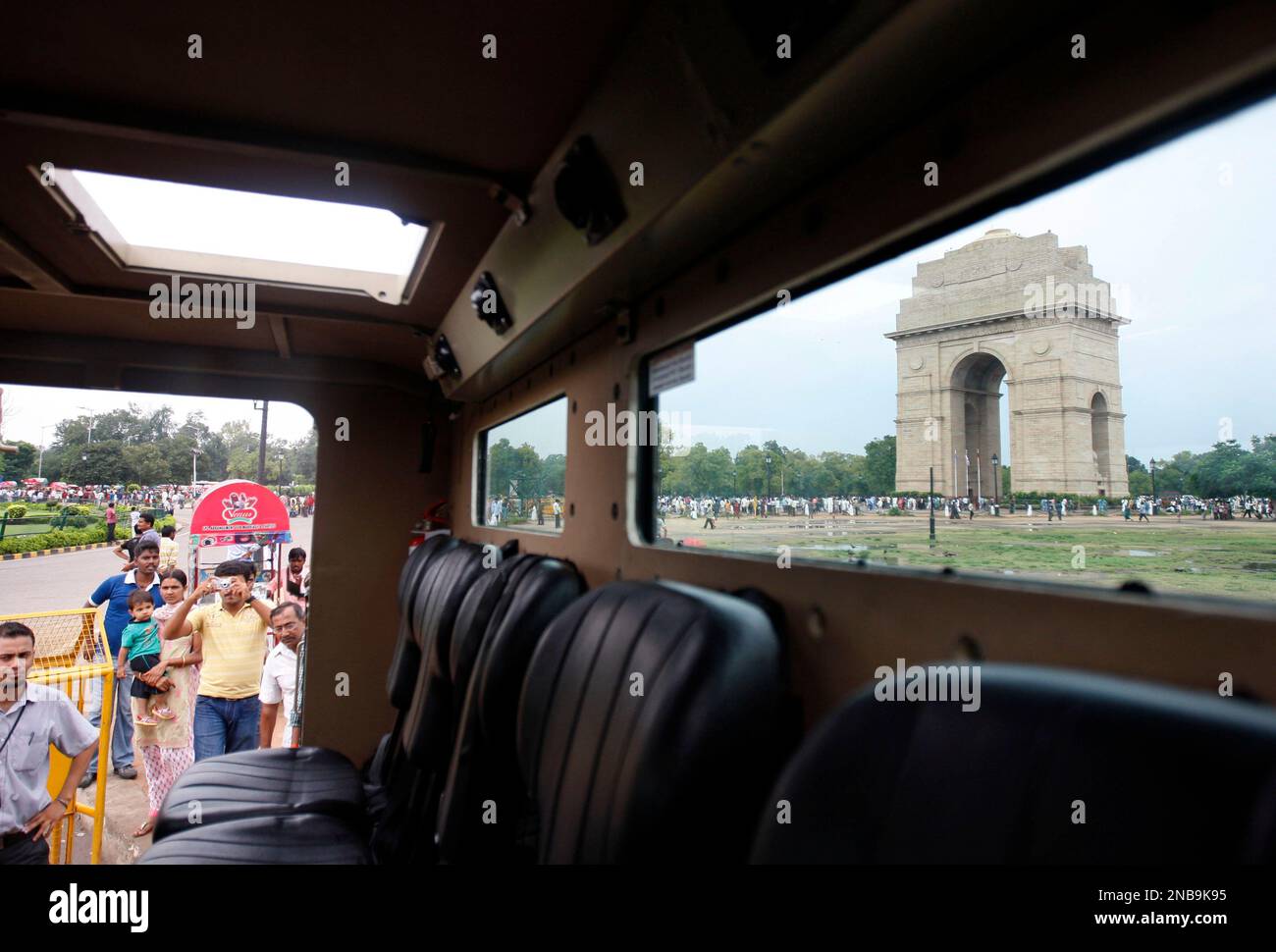 People look on as the Mine Protected Vehicle (MPV-I) developed by the ...
