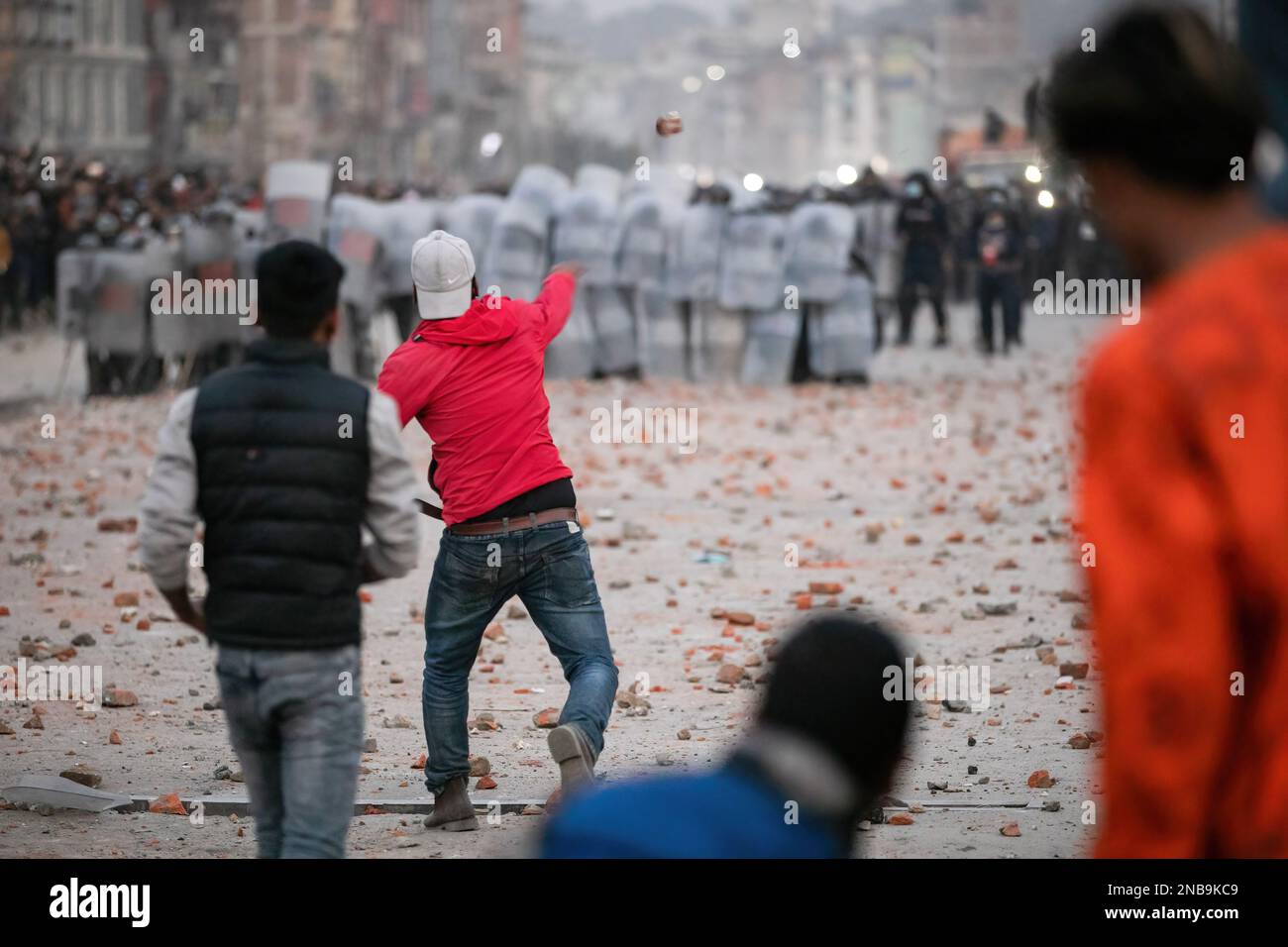 Kathmandu, Nepal. 13th Feb, 2023. Protesters hurl bricks and stones at ...