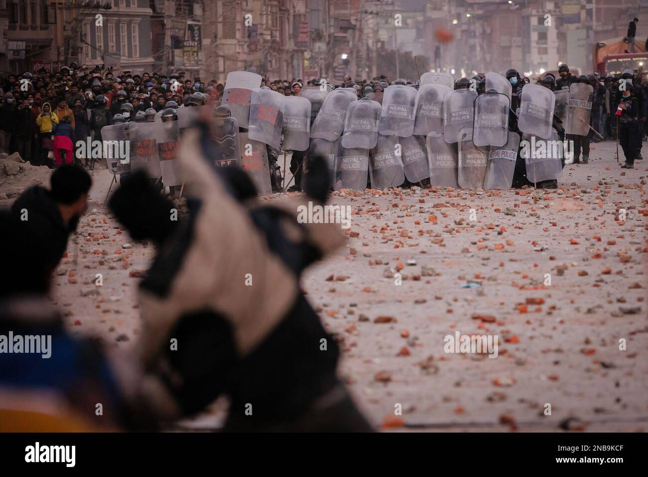 Kathmandu, Nepal. 13th Feb, 2023. Protesters hurl bricks and stones at ...