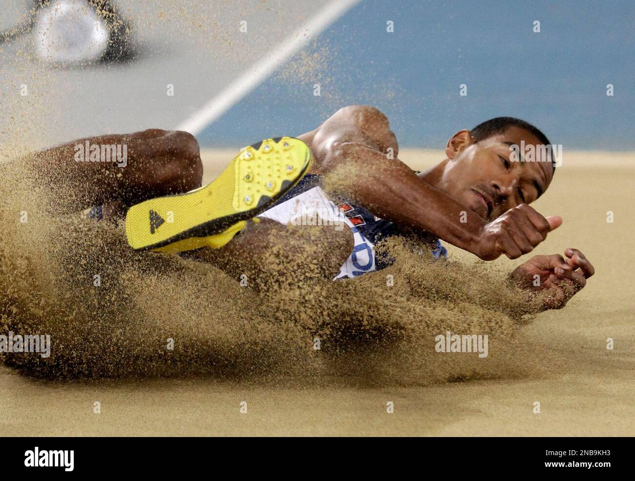USA's Christian Taylor lands in sand pit on his way to winning the gold ...