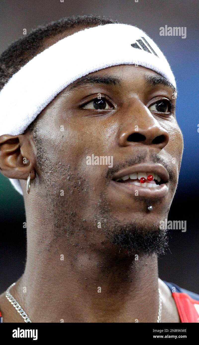 Britain's Phillips Idowu celebrates after taking the silver medal in ...