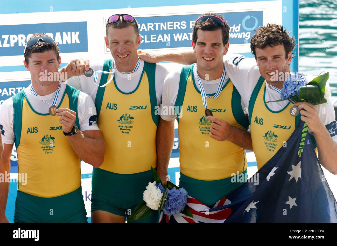 The team of Australia display their bronze medals at the podium of the ...