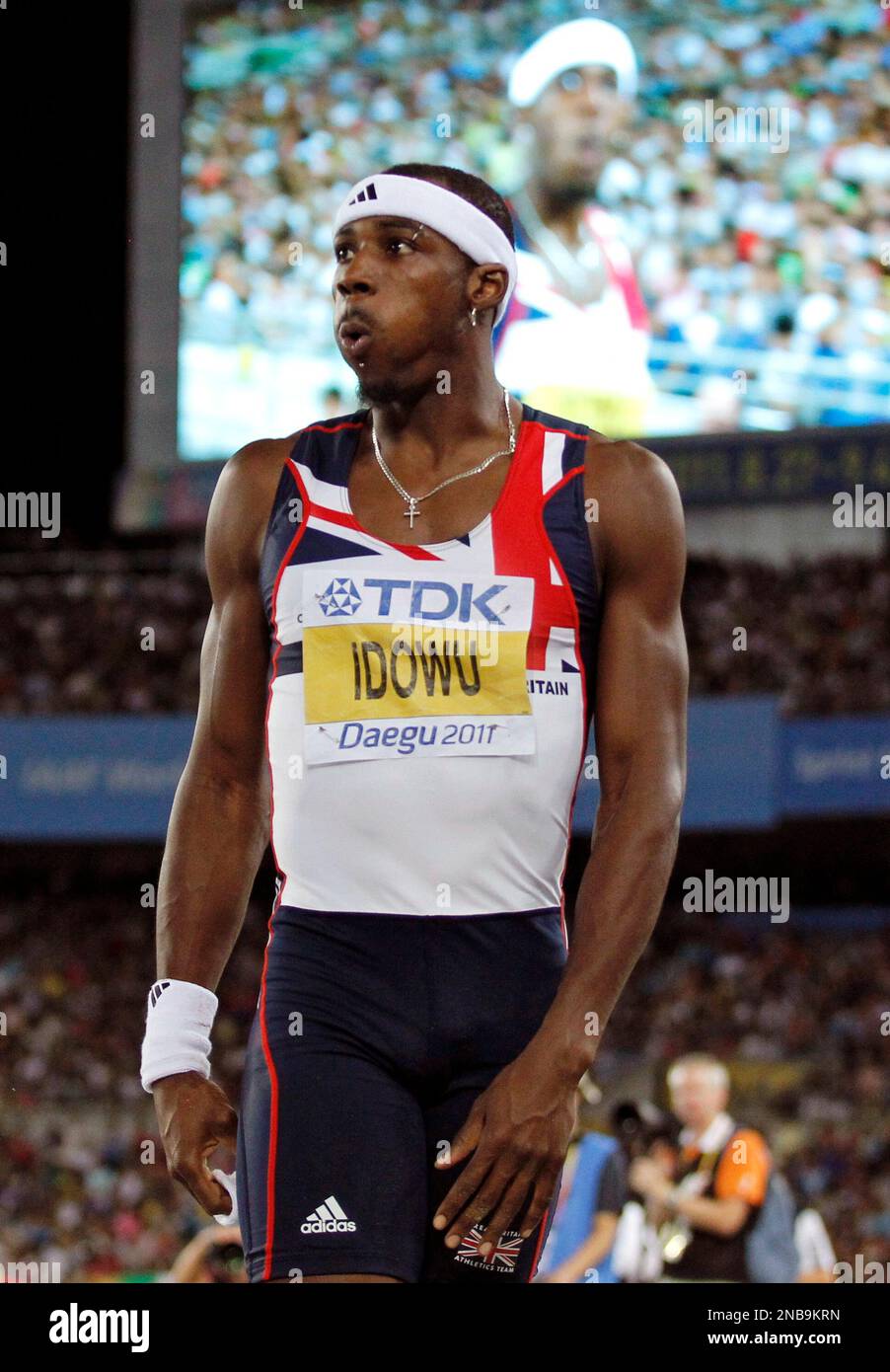 Britain's Phillips Idowu celebrates after taking the silver medal in ...