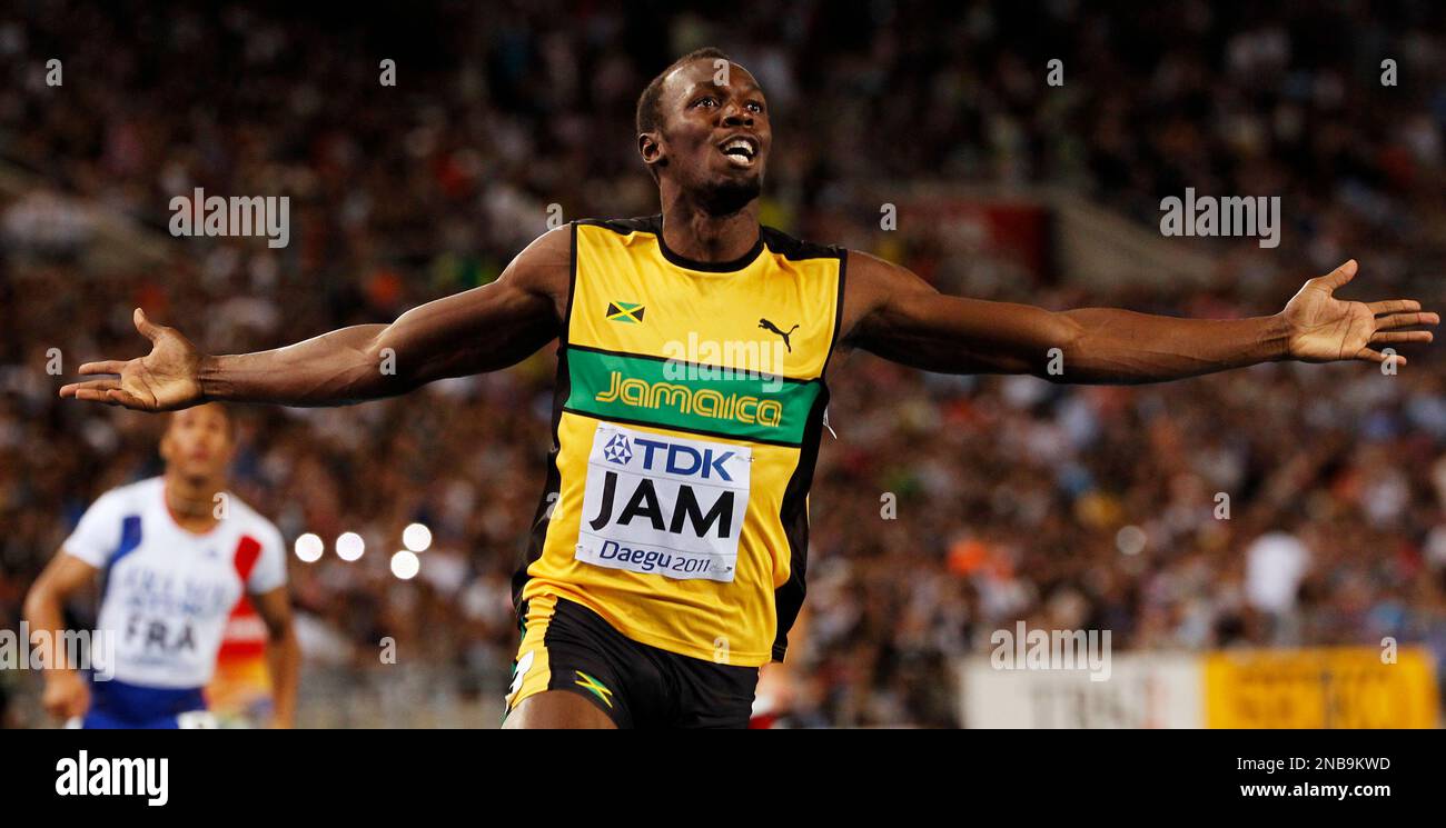Jamaica's Usain Bolt celebrates winning the Men's 4x100 Relay final and ...